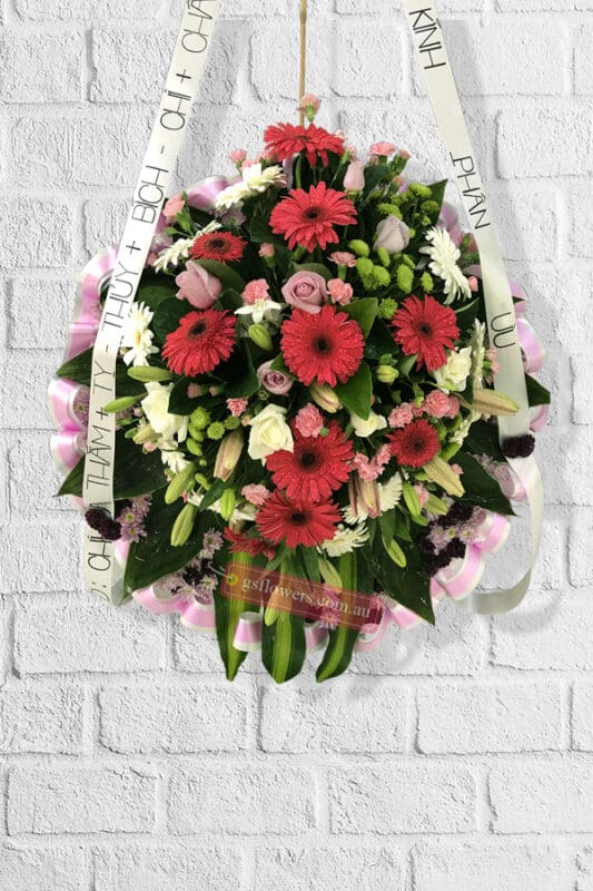 Funeral Round Shaped Wreath Roses Lily Delivery in Melbourne